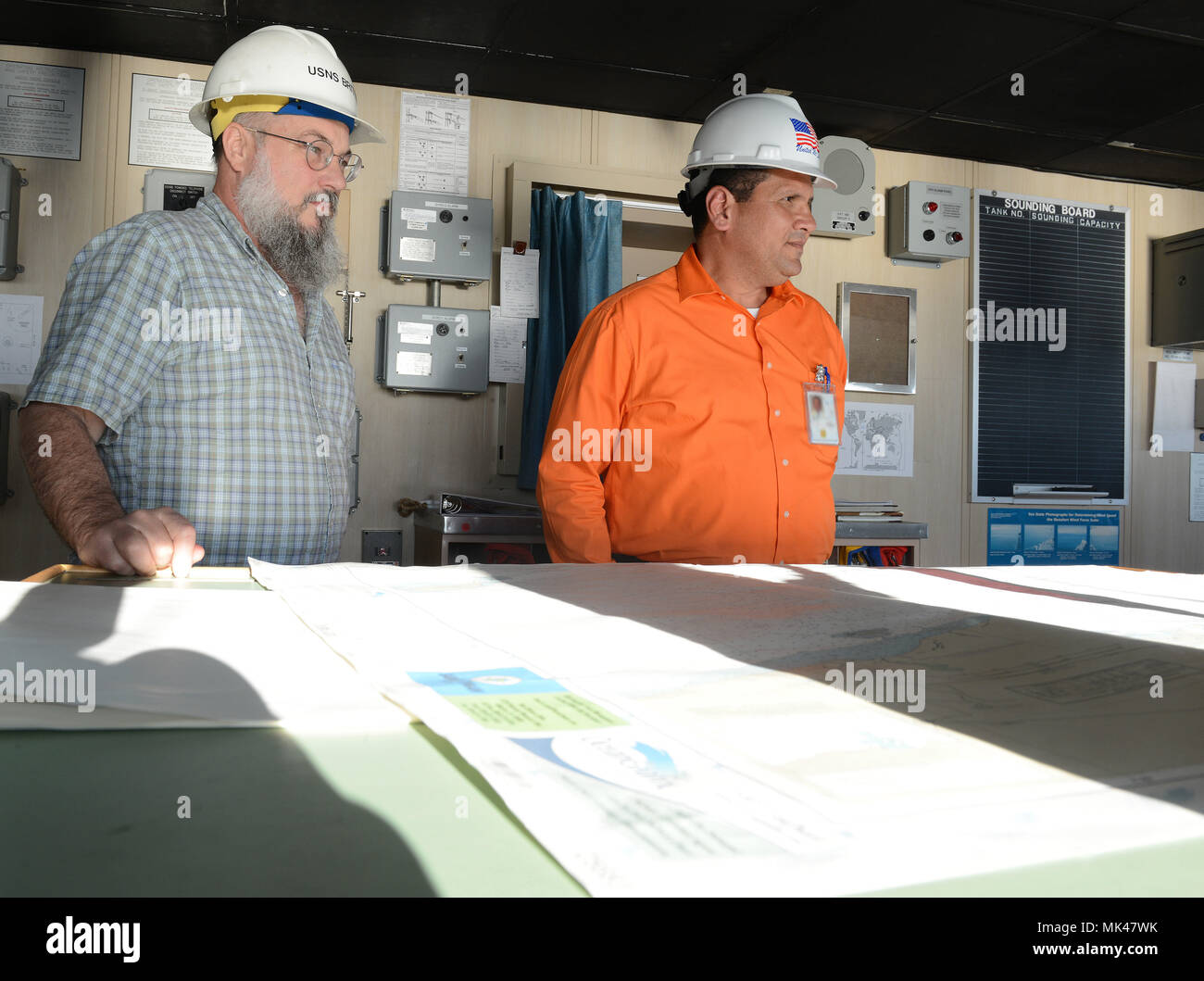 Alfred Murray, captain of Military Sealift Command’s USNS Brittin, and ...