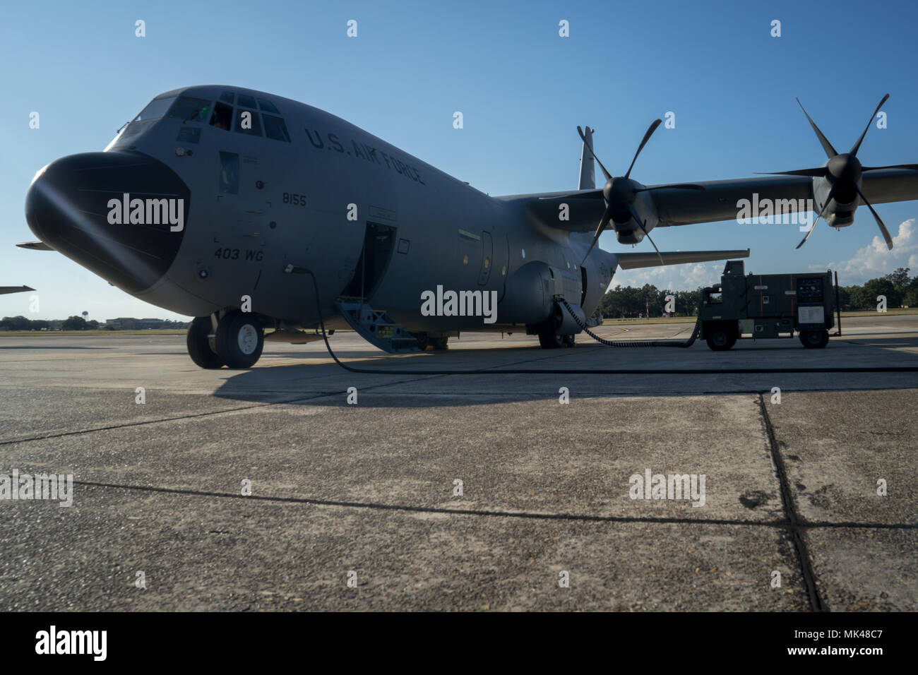 Airmen with the 815th Airlift Squadron prepare a C-130 Super Hercules ...