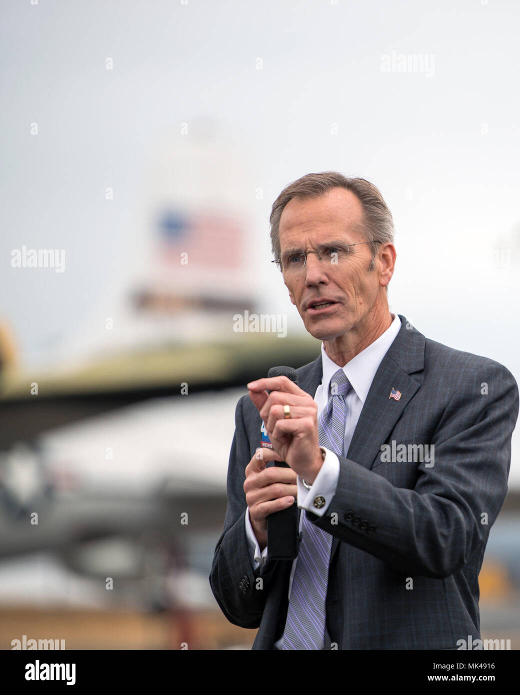 Paul Robins of Fox40 News, Sacramento, does a live report at the Travis ...