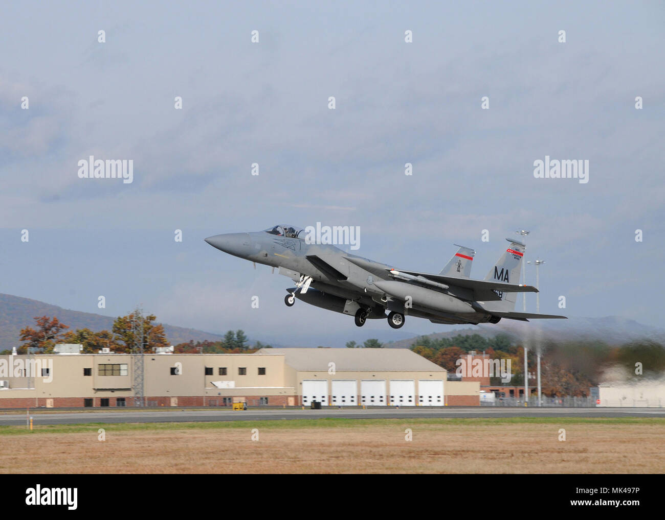 Ten F-15s from the 104th Fighter Wing take-off for a Checkered Flag ...