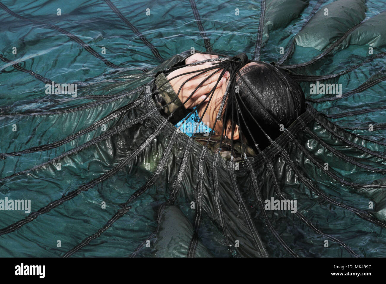 U.S. Army Spc. Emily Moller, assigned to the 1st Battalion, 1st Air ...