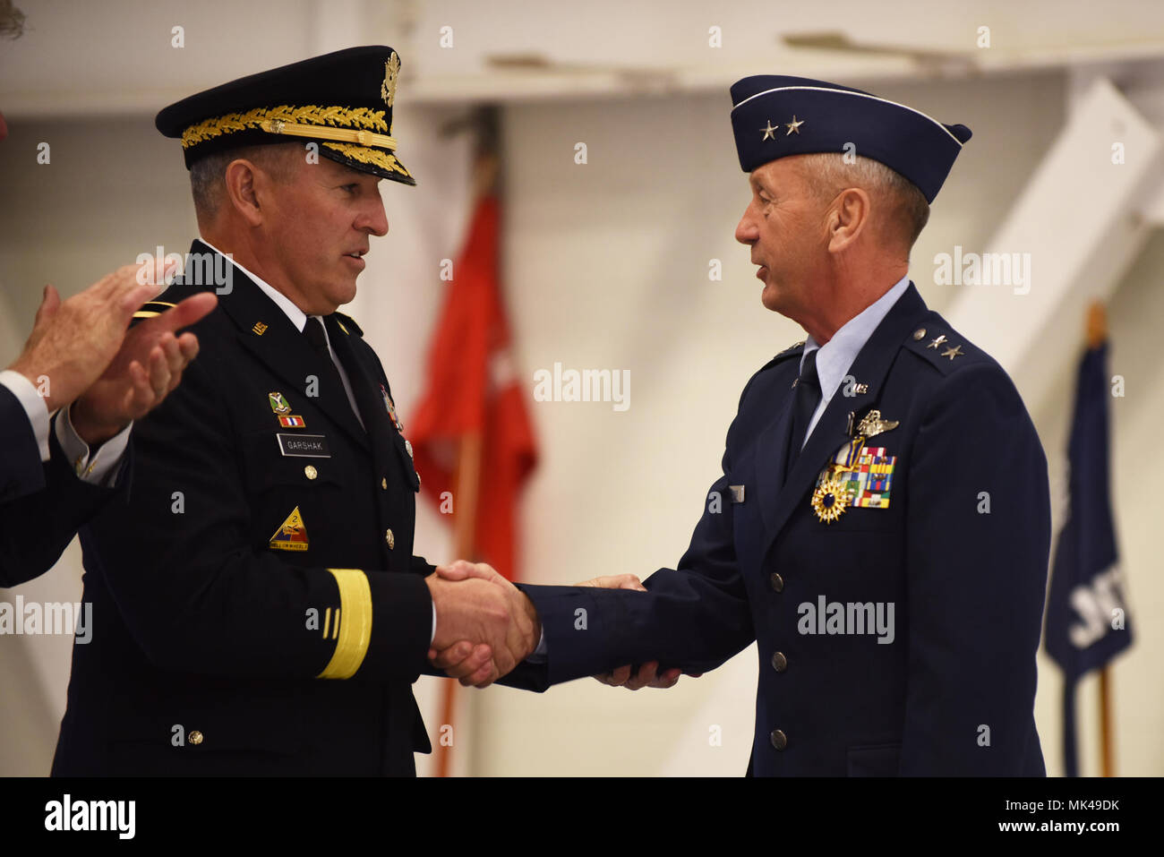 The outgoing Commanding General Maj. Gen. Gary Sayler congratulates the ...