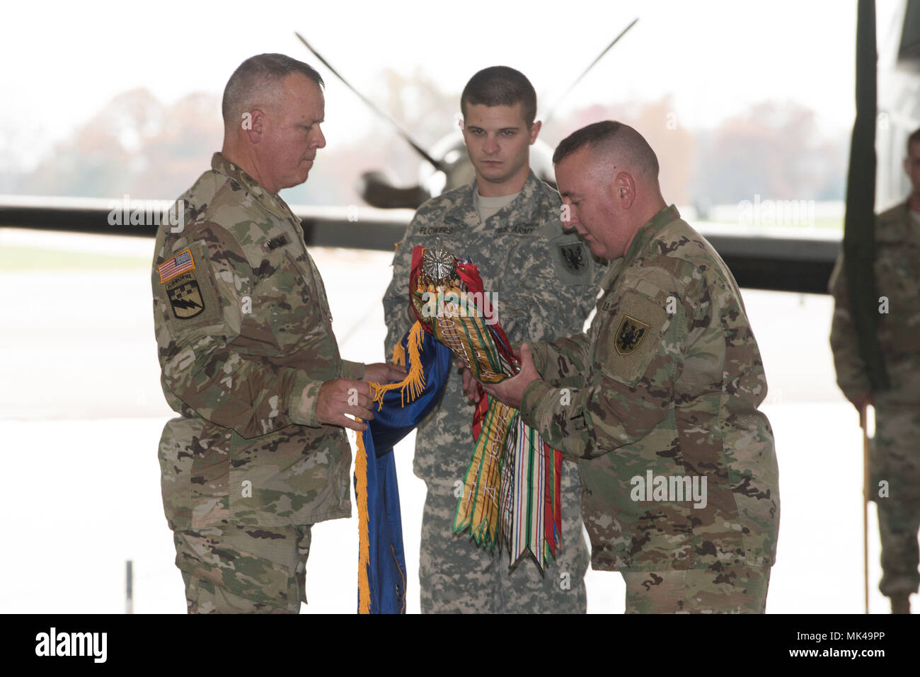 BG Scott Morcomb and CSM James Matthews prepare the retired battalion ...