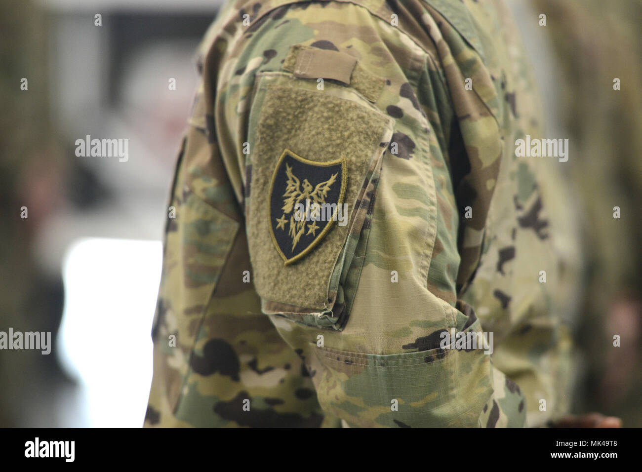 A soldier displays the new battalion patch during the ARAC Patch ...