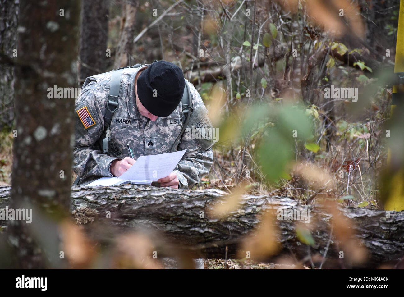 Sergeant Thomas Hardy, from 418th Civil Affairs Battalion, plots grid ...