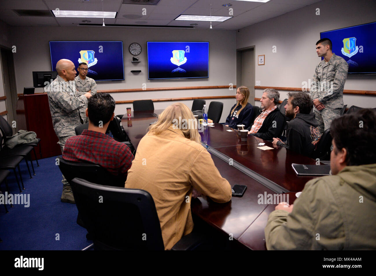 U.S. Air Force Colonel Taft O. Aujero (left), wing commander, 129th ...
