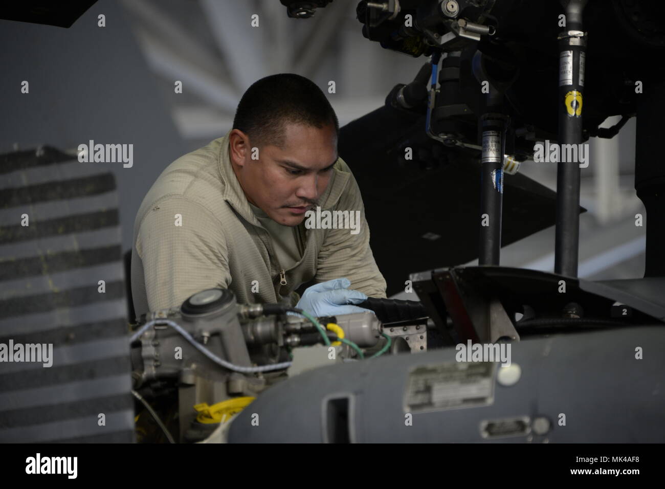 U.S. Air Force Senior Airman Cecil Zamora and Staff Sgt. Joshua Tidwell ...
