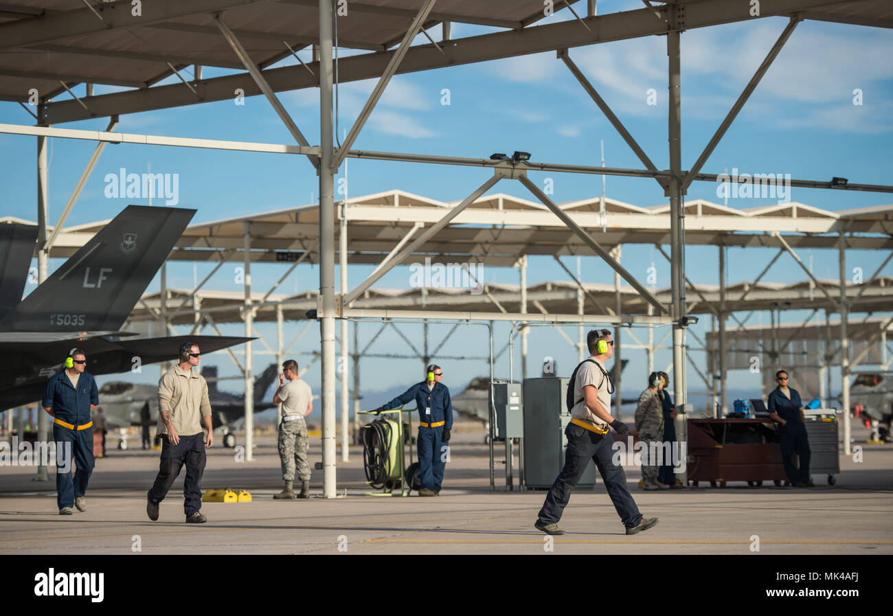 Airmen assigned to the 56th Fighter Wing prepare the flight line for ...