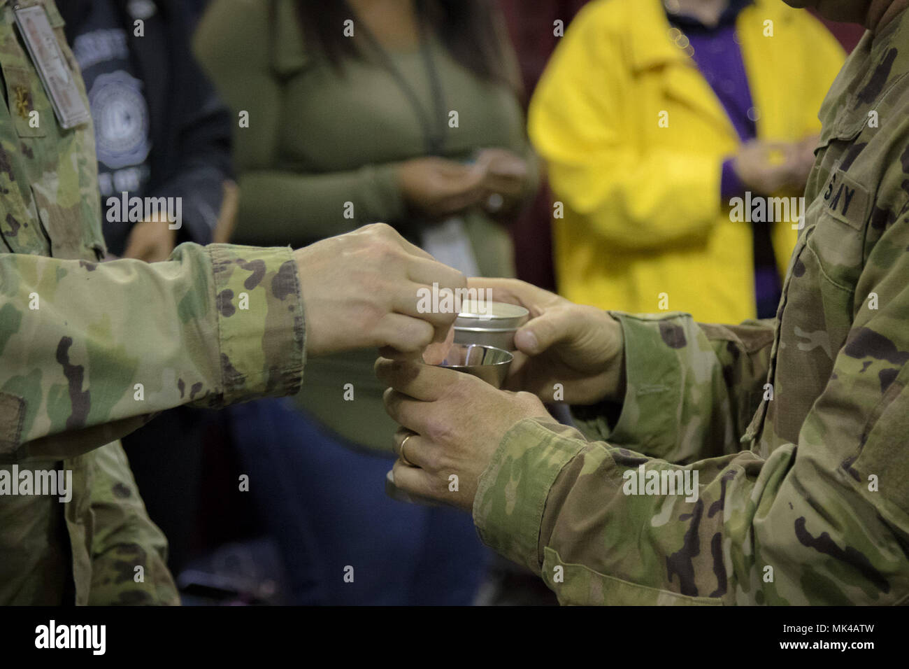 SAN JUAN, Puerto Rico — A US Soldier prepares to receive the Eucharist ...