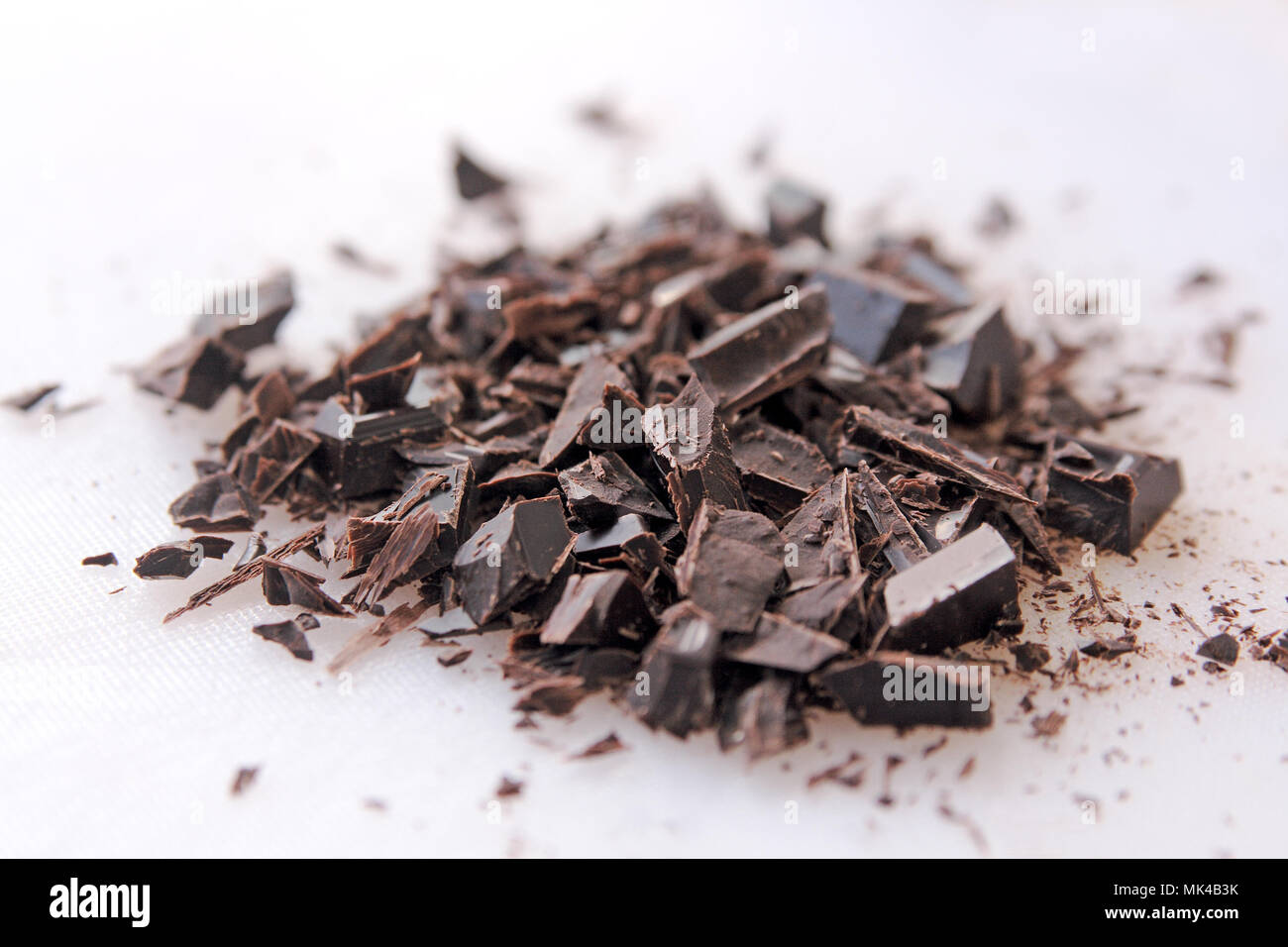 A pile of chopped dark chocolate pieces Stock Photo - Alamy
