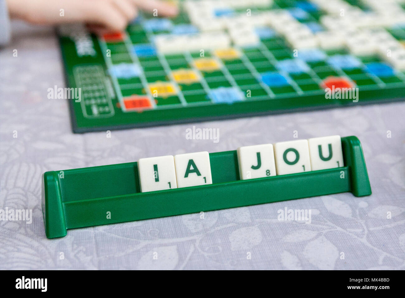 Family playing scrabble hi-res stock photography and images - Alamy