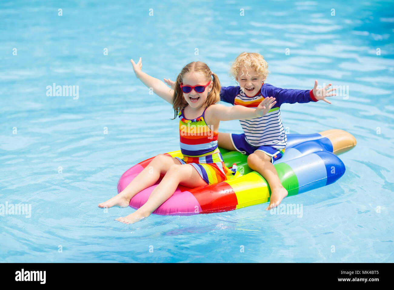 Girl floating in inflatable raft hi-res stock photography and images ...