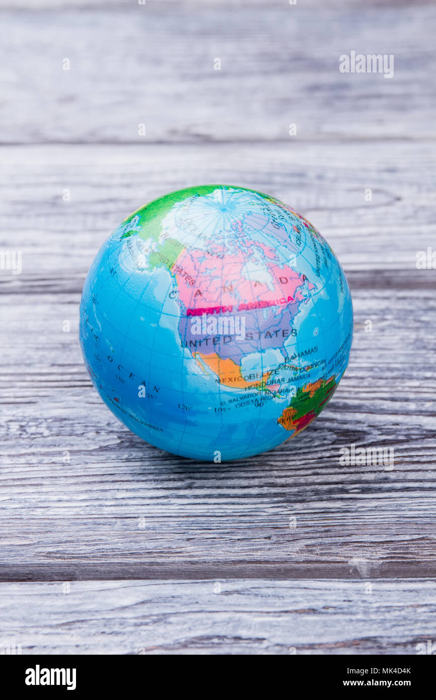 Earth world map globe. Cropped view. Wooden desk surface background ...