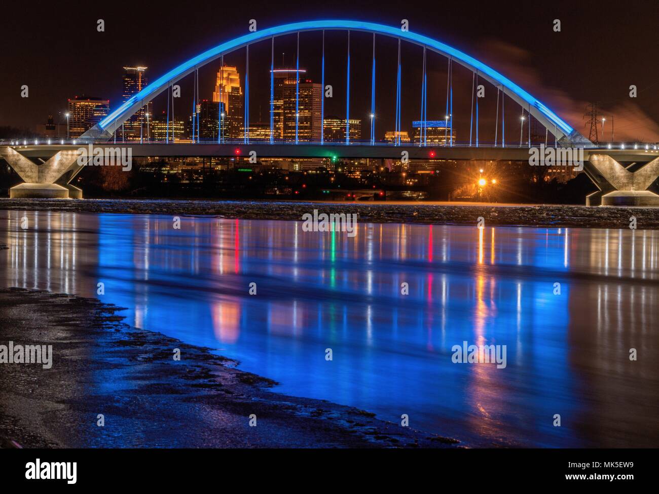 Lowry Bridge colored blue with Minneapolis Skyline behind Stock Photo ...