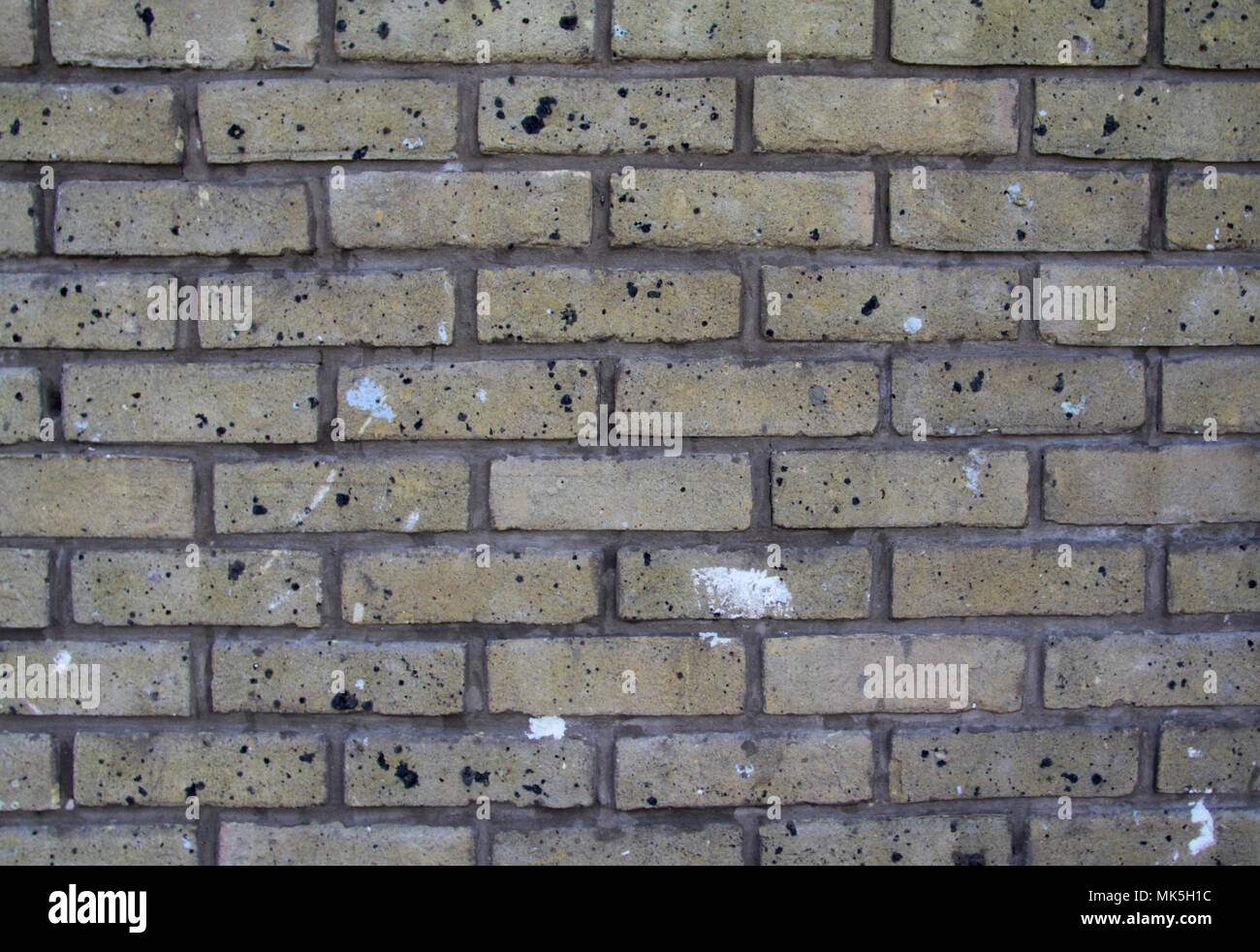 Dirty Brown Brickwork brick wall Stock Photo - Alamy