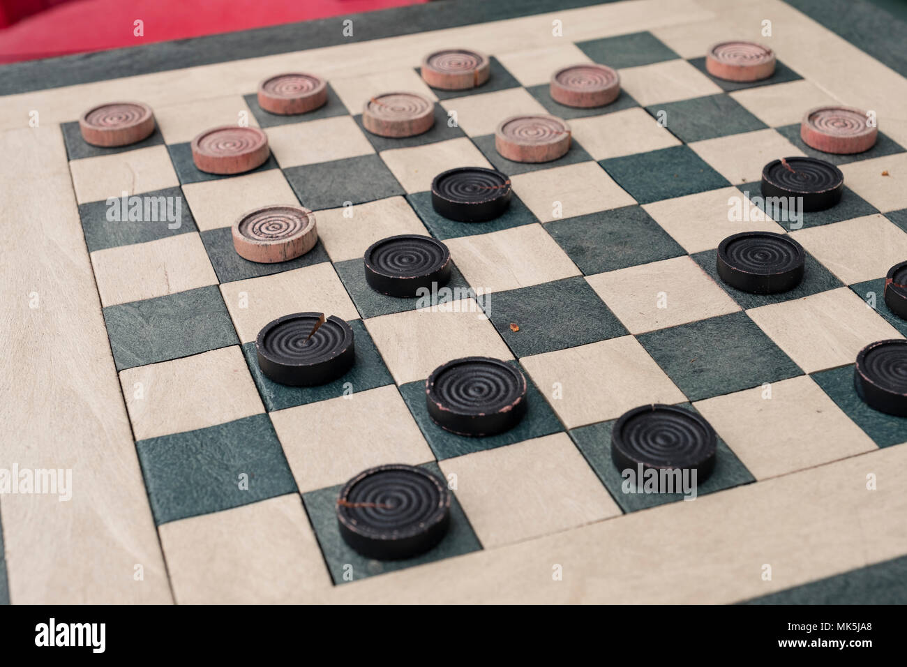 checkers game in public on sidewalk, step up and take a seat to play ...