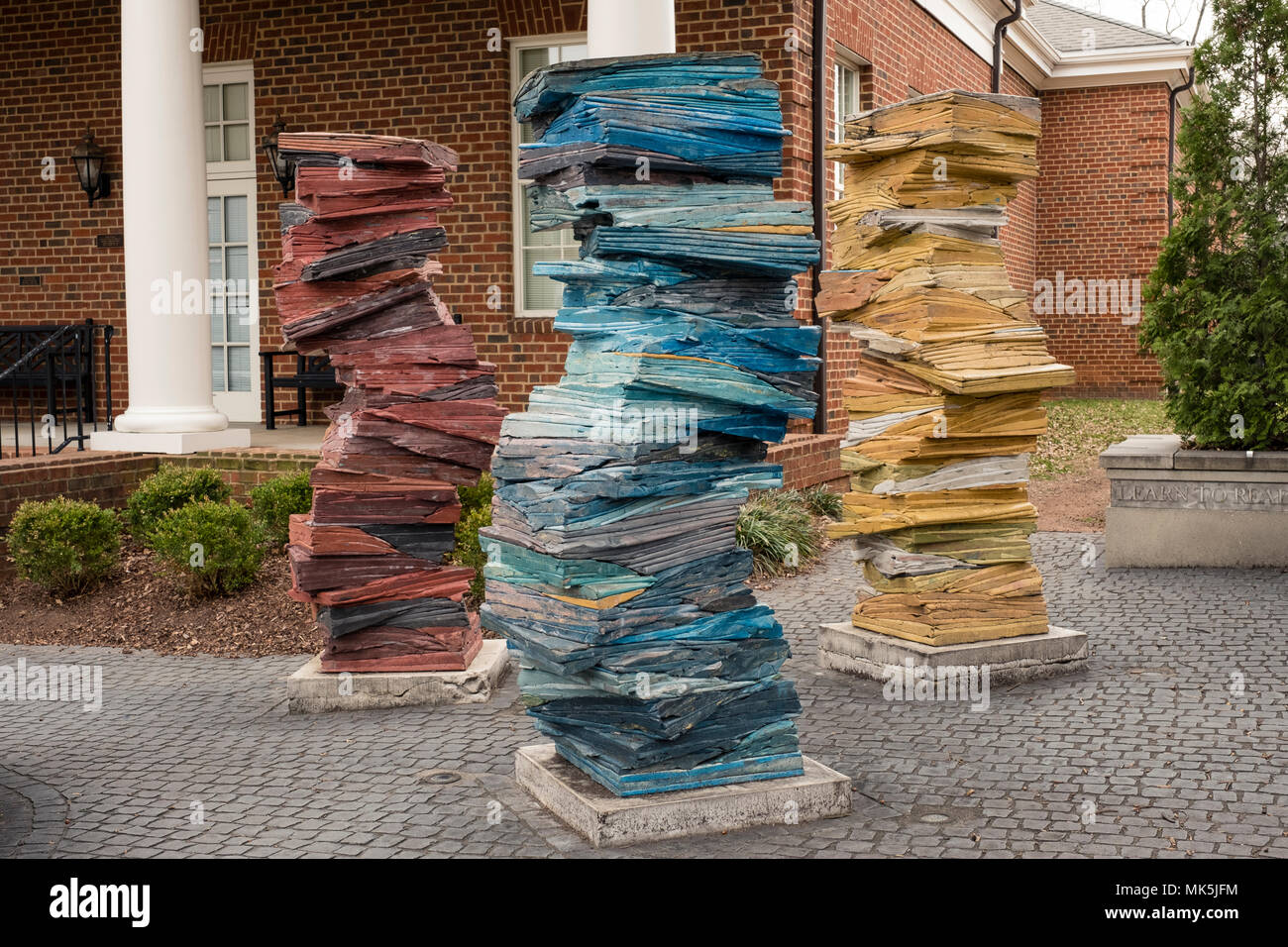 books stacked colorful display on sidewalk Stock Photo - Alamy