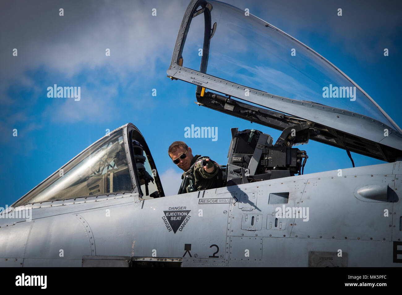 Maj. Joseph Morrin, A-10 Heritage Flight Team pilot, points to team ...