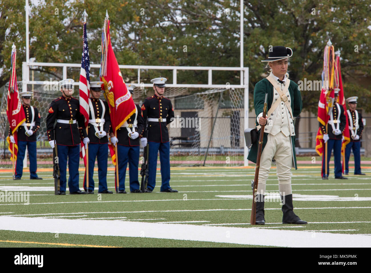 A U.S. Marine dressed in a historical uniform participates in the Joint ...