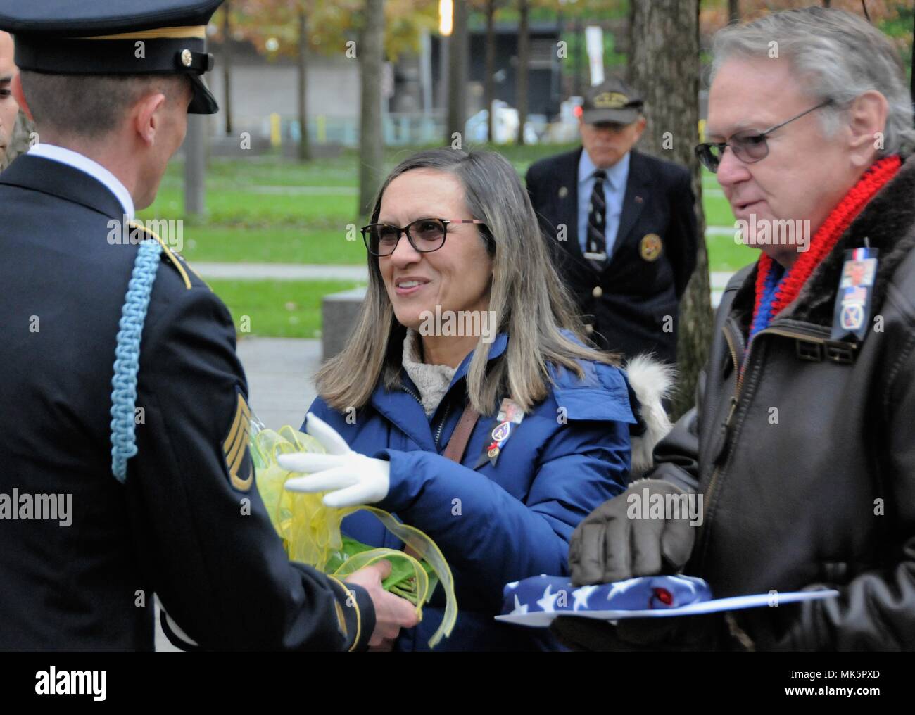 Gold Star Family members Bob and Linda Ollis are honored during a ...
