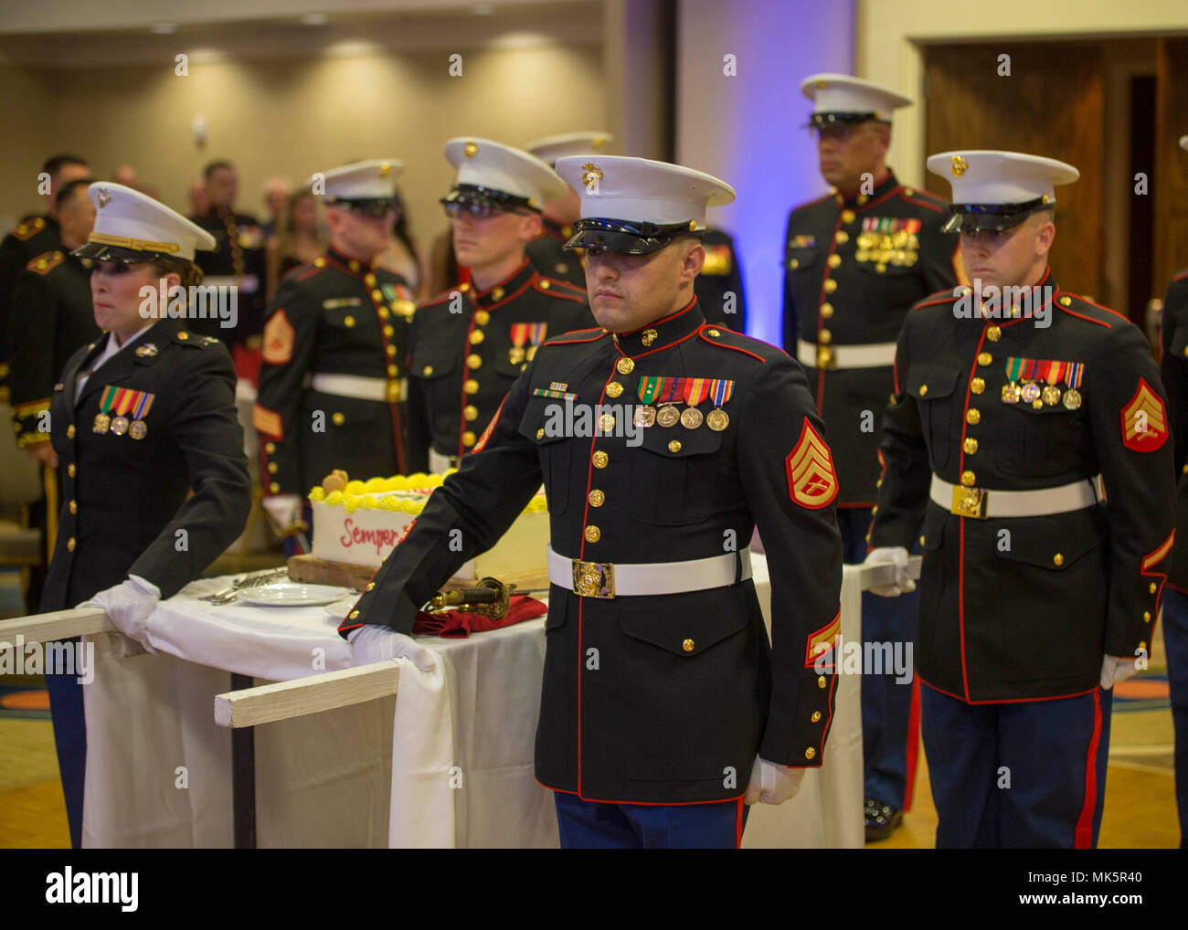 U.S. Marines with the 6th Marine Corps District (6MCD) escort the ...