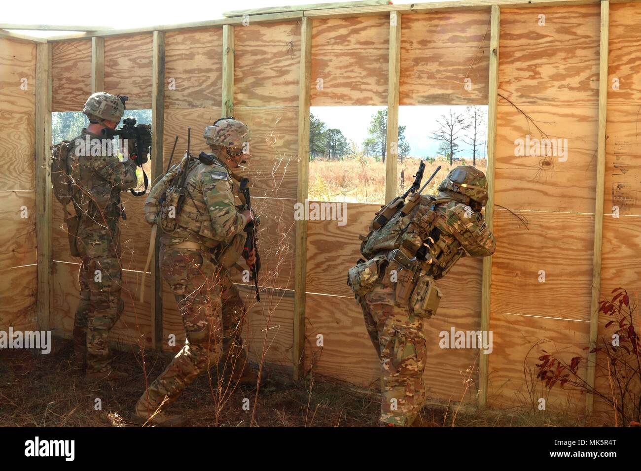 Soldiers from 1st Security Force Assistance Brigade engage a simulated ...