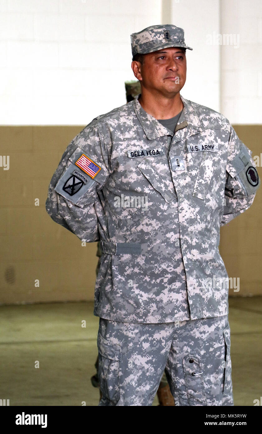 U.S Army Chief Warrant Officer Four Darryn S. Dela Vega stands in ...