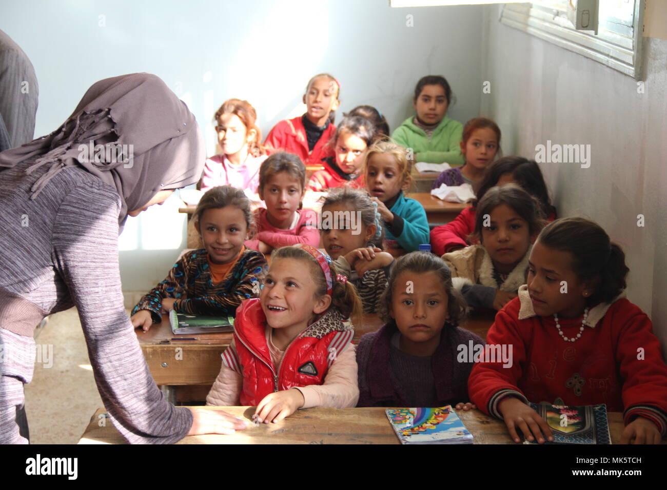 Children begin classes at the newly reopened Al Rasheed primary school Nov. 9, 2017. The school ...