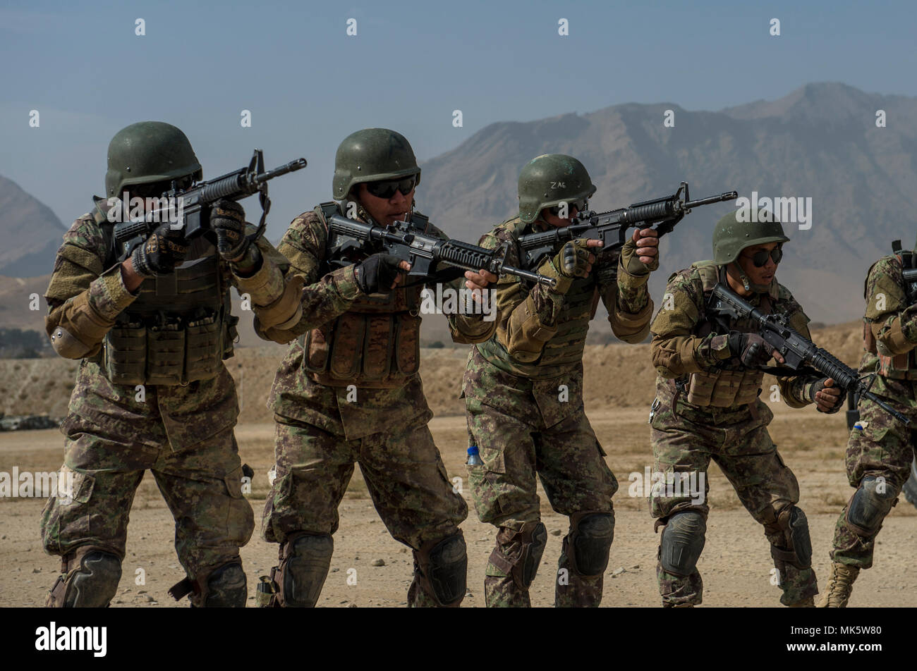 Afghan Commando trainees conduct reflexive fire drills during training ...