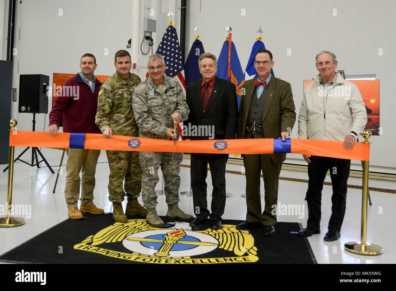 Maj. Gen. Tony Carrelli, Pennsylvania’s adjutant general, cuts the ...