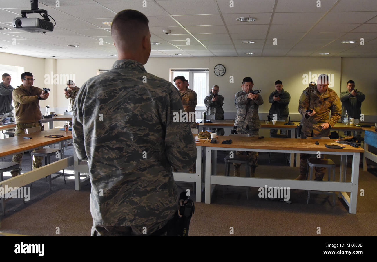 A Combat Arms Training and Maintenance instructor, assigned to the 48th ...
