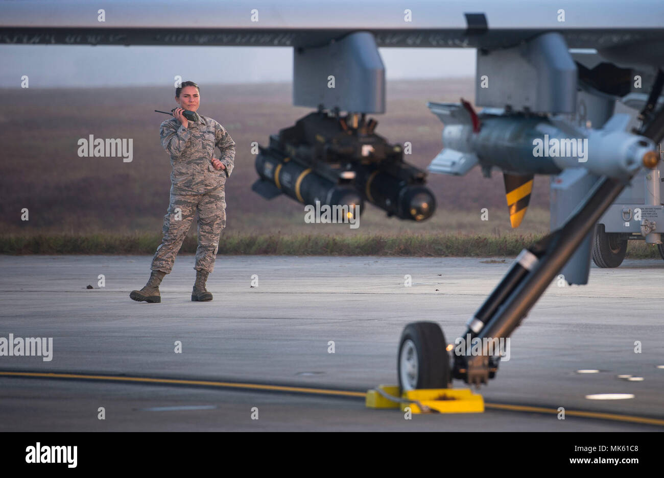 An Airman radios the MQ-9 ground control station during Combat Hammer ...