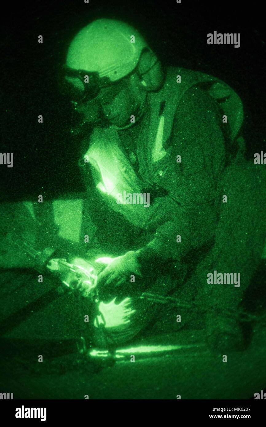 A U.S. Marine with Marine Medium Tiltrotor Squadron (VMM) 162 (REIN ...