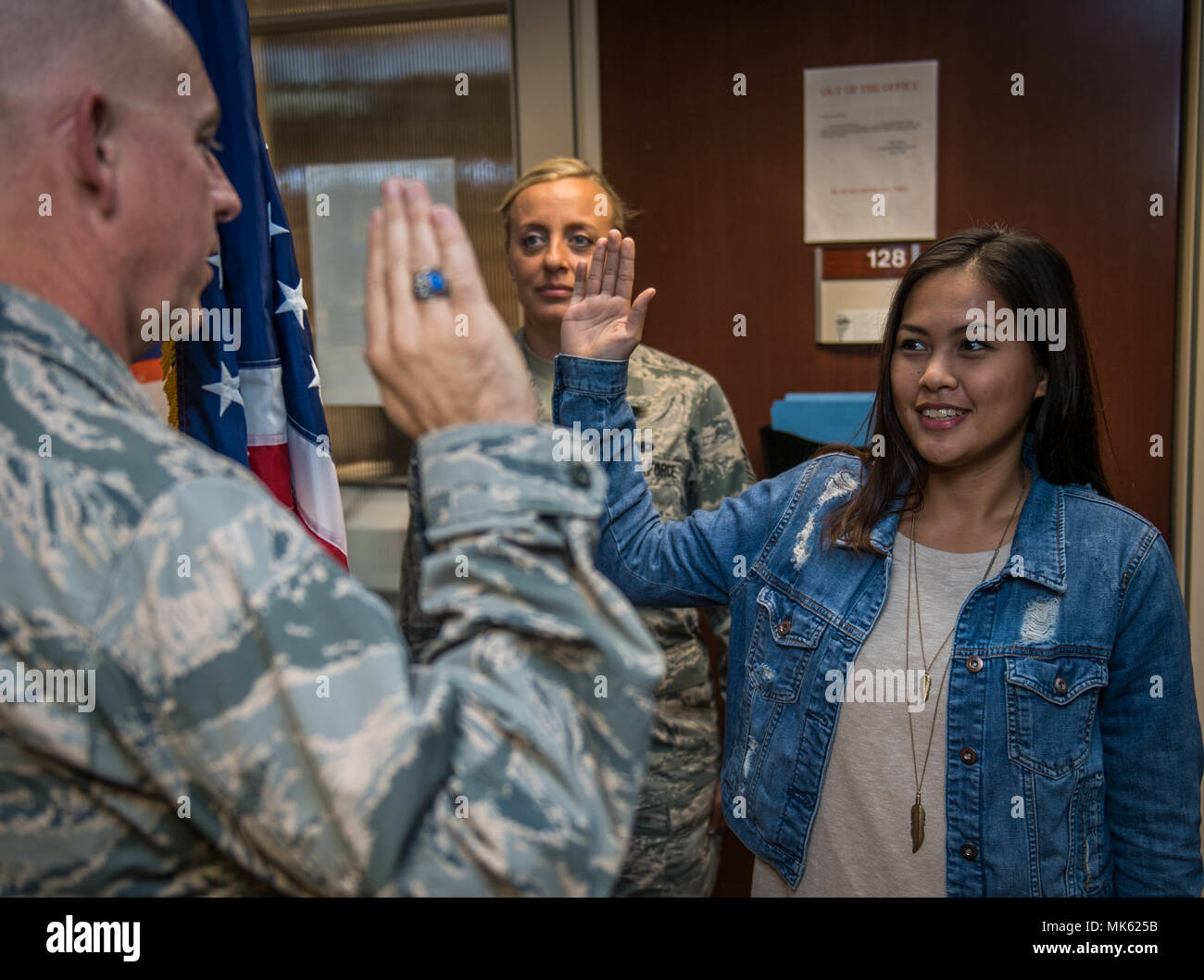 Chloe Leonado, recites the oath of enlistment, given by Lt. Col. Stan ...
