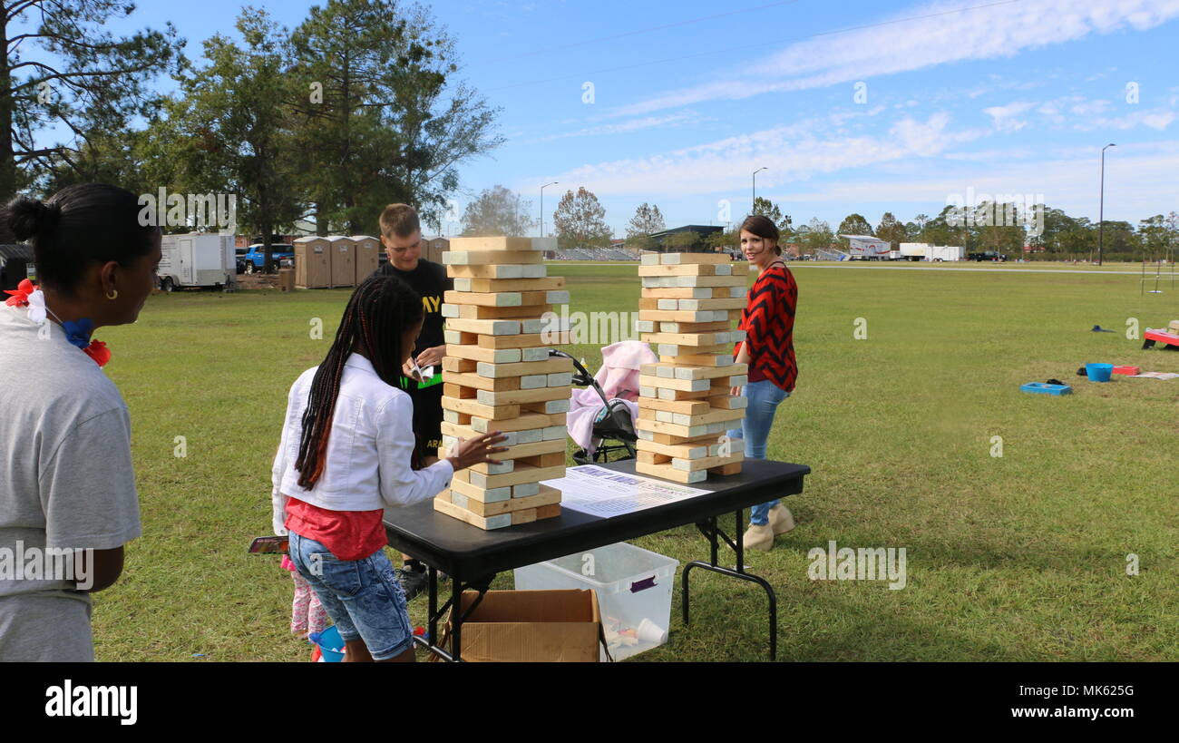 Families play Giant Jenga at family fun day during this year’s Marne ...
