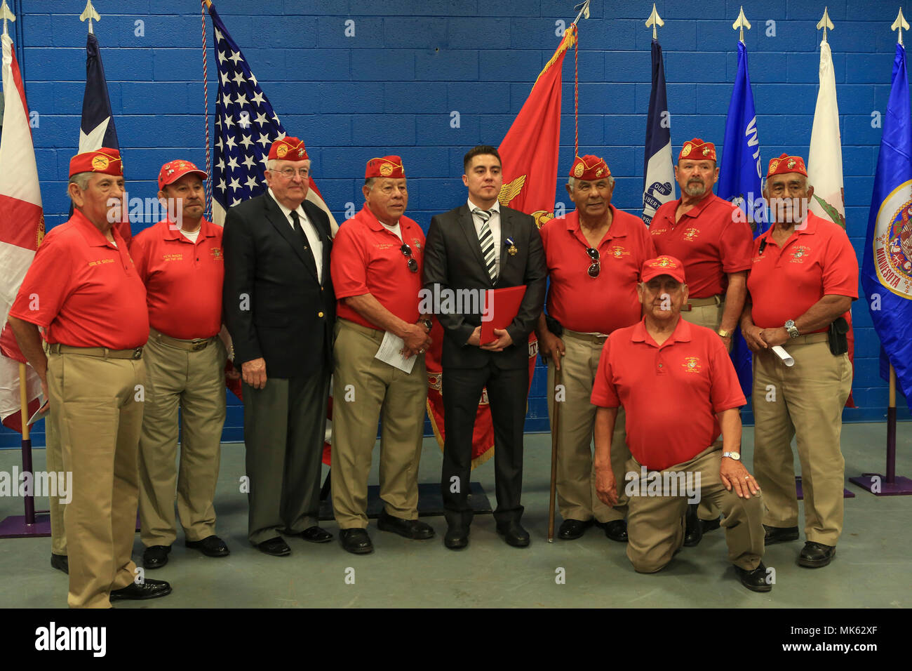 Marine Corps Veteran Lance Cpl Benjamin Gonzalez Poses With Members