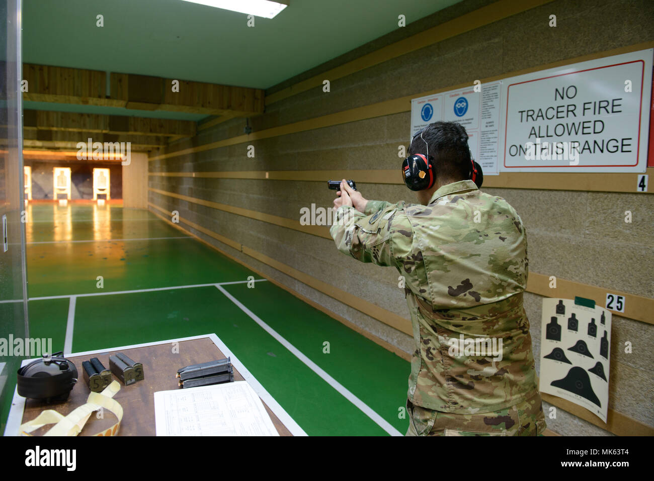 A U.S. Soldier with the 650th Military Intelligence Group shoots with ...
