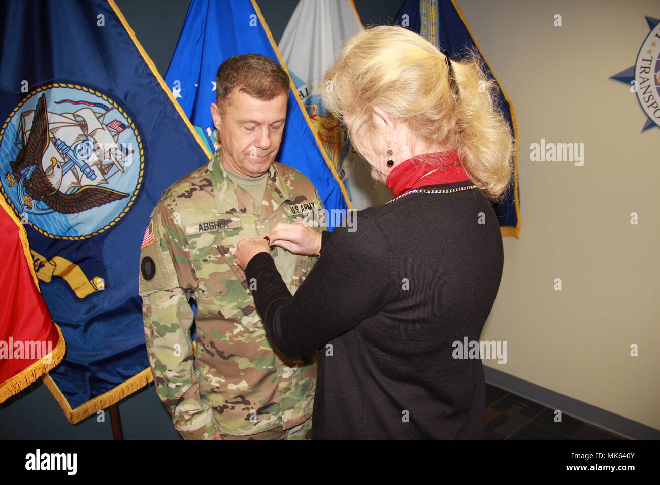 Army Reserve Col. Donald Absher receives his first star from wife Linda ...