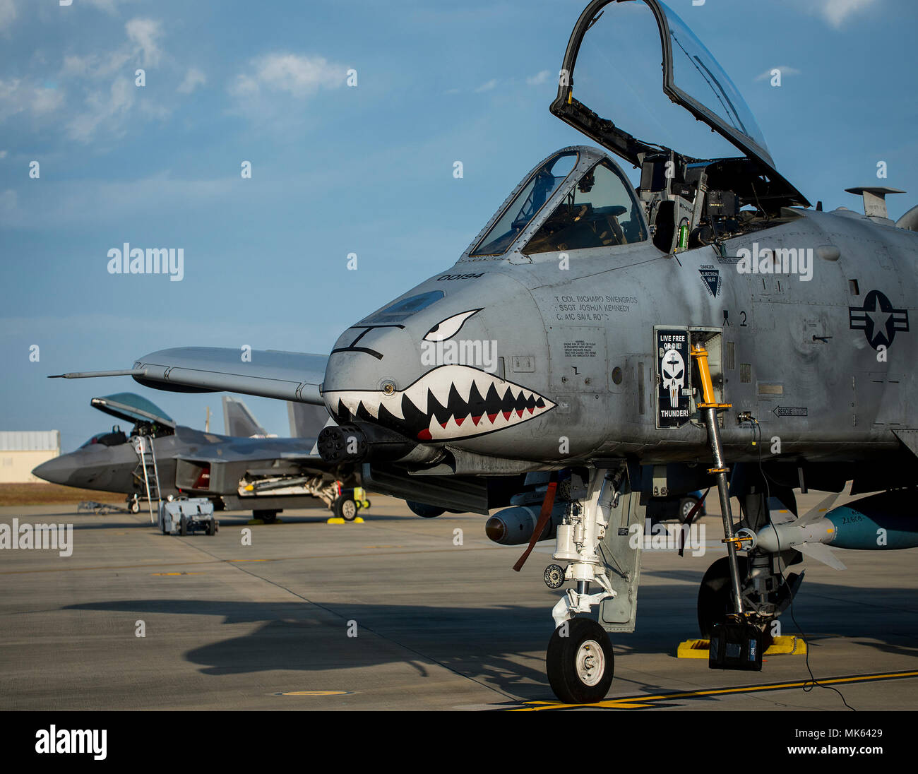 A 75th Fighter Squadron A-10 Thunderbolt II and a 1st Fighter Squadron ...