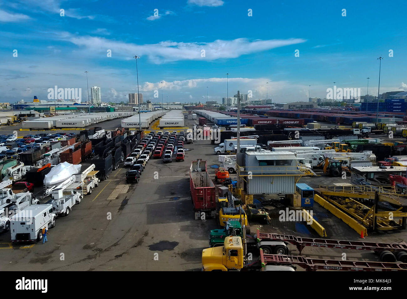 SAN JUAN, Puerto Rico -- Shipping containers are organized by size and ...
