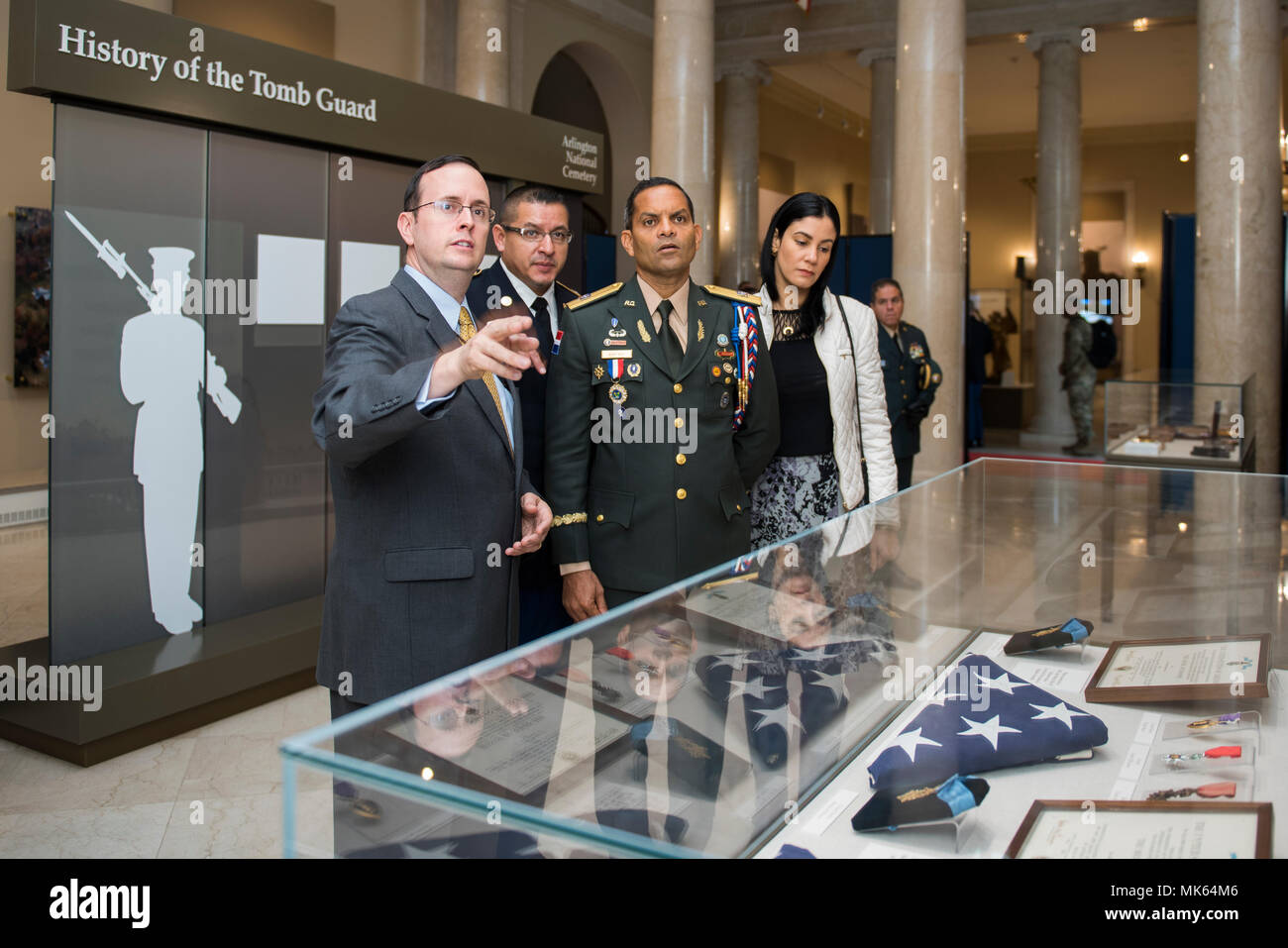 Tim Frank (left), historian, Arlington National Cemetery; gives a tour ...