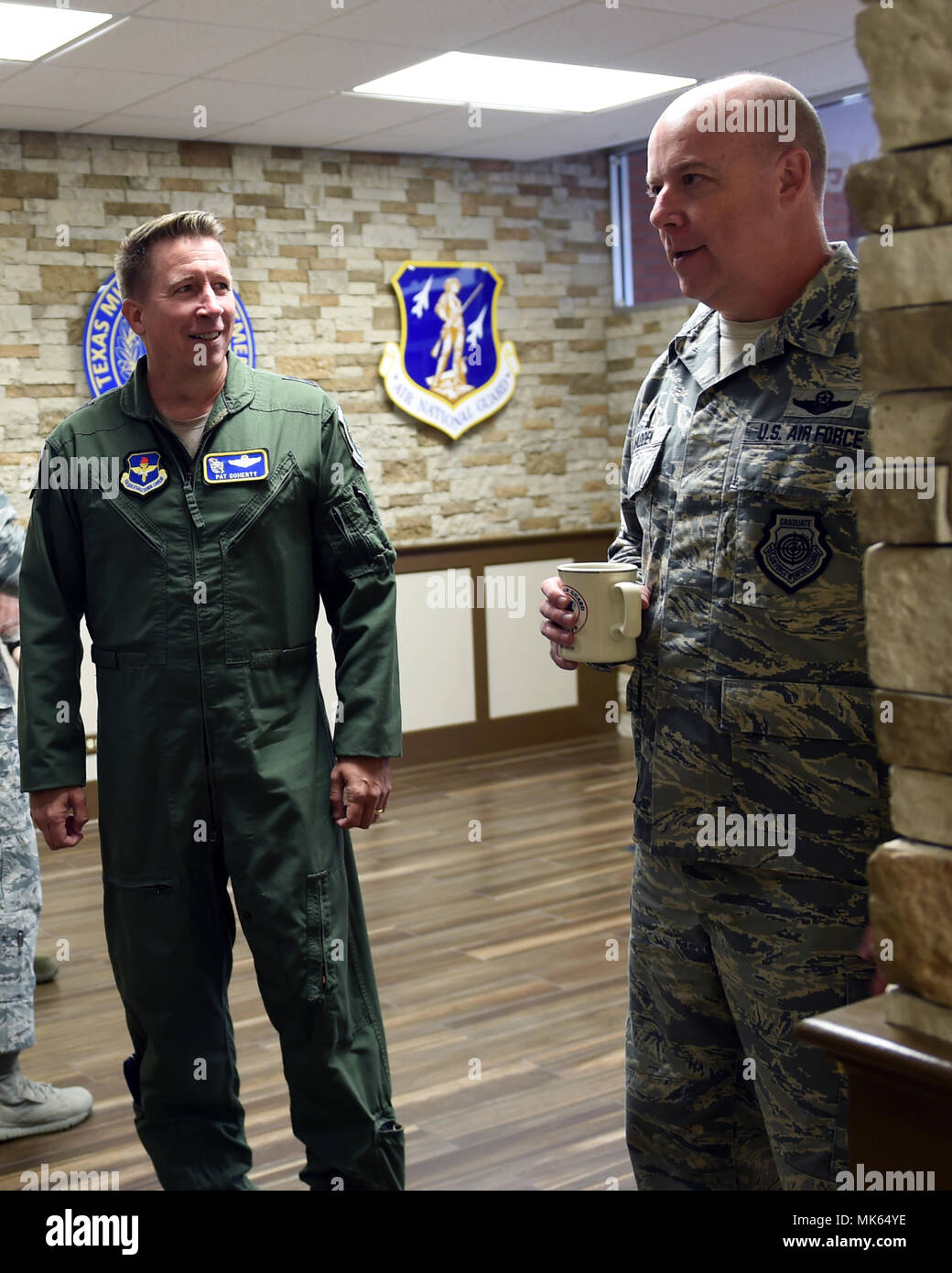 Maj. Gen. Patrick Doherty, the 19th Air Force commander, talks to Col ...
