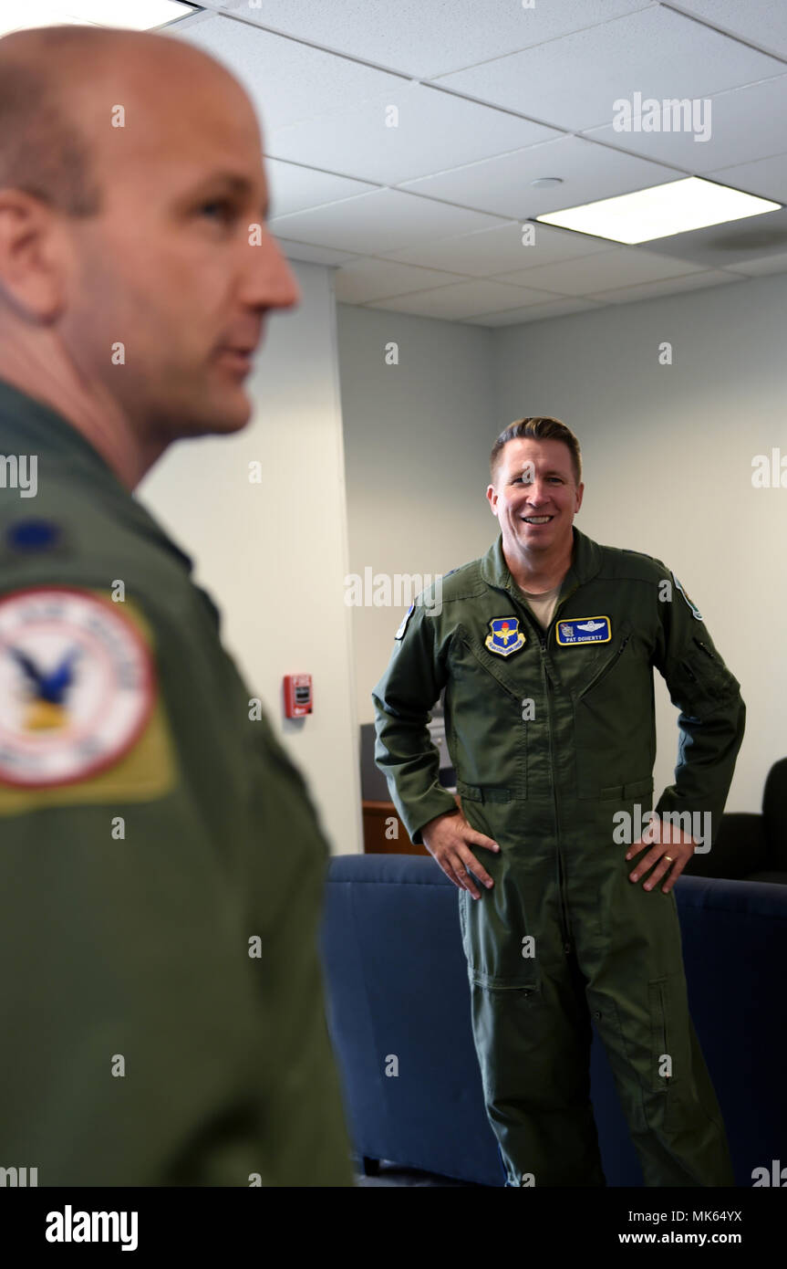 Maj. Gen. Patrick Doherty, 19th Air Force commander, talks to Lt. Col ...