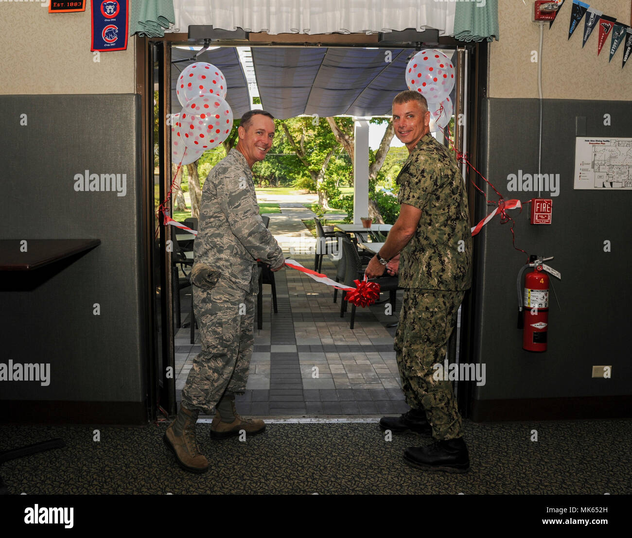 U.S. Air Force Col. Kevin Gordon, 15th Wing commander, and U.S. Navy ...