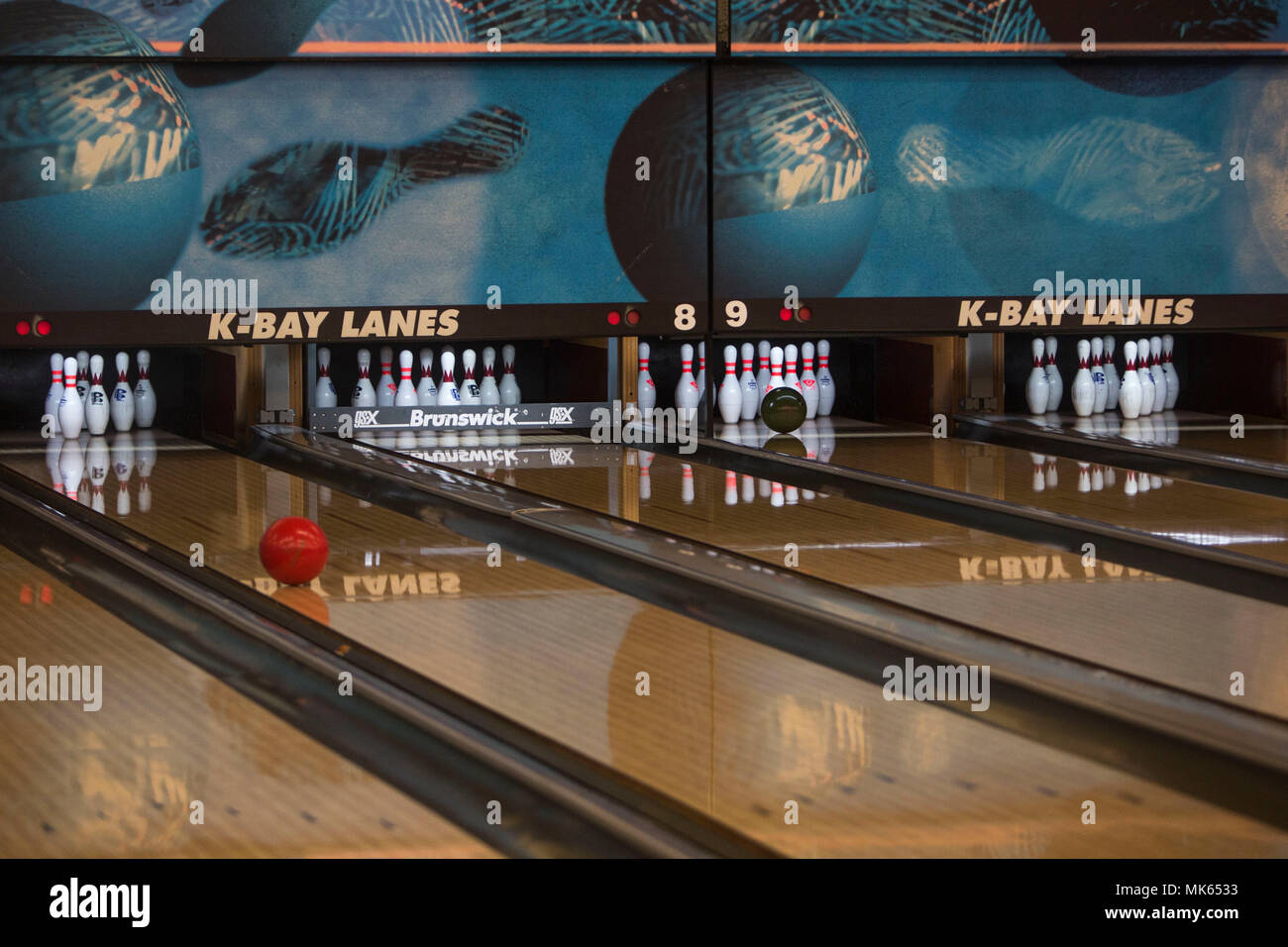 Competitors practice bowling during a competition for the Hawaii ...