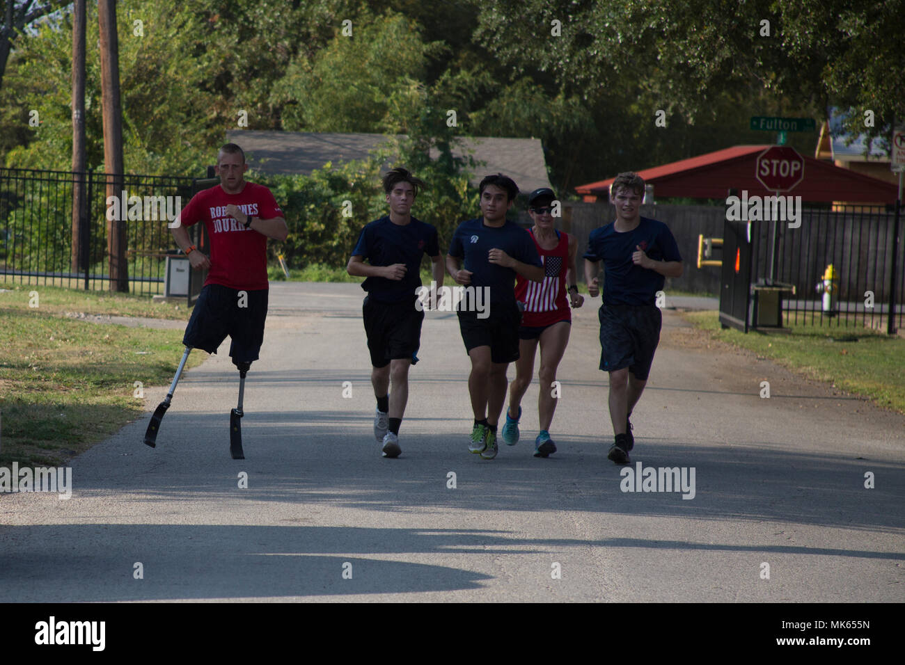 Rob Jones, a Marine Corps veteran, finishes a lap from his marathon ...