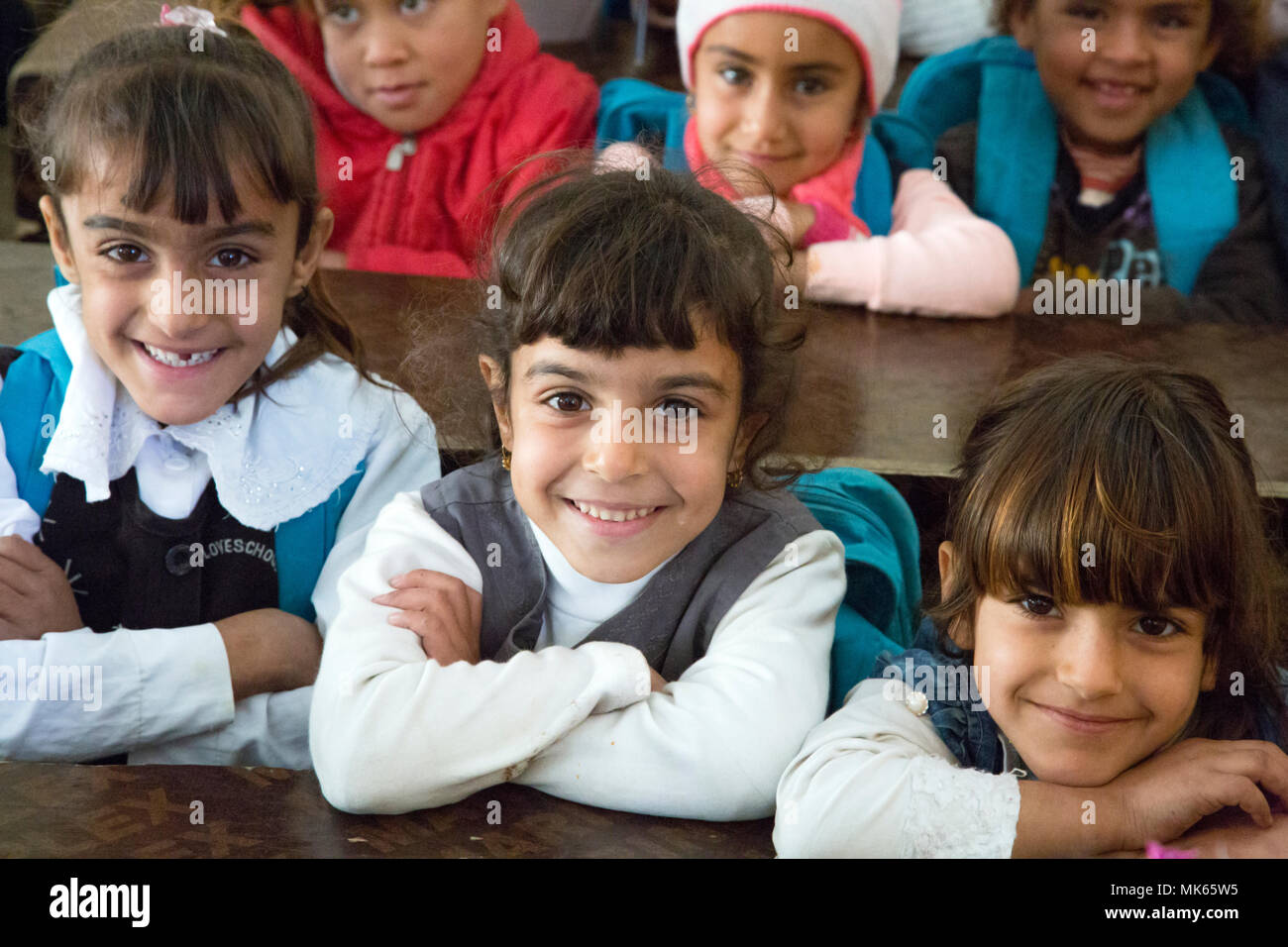 Young Iraqi students pose for a photo at a primary school, Aski Mosul ...