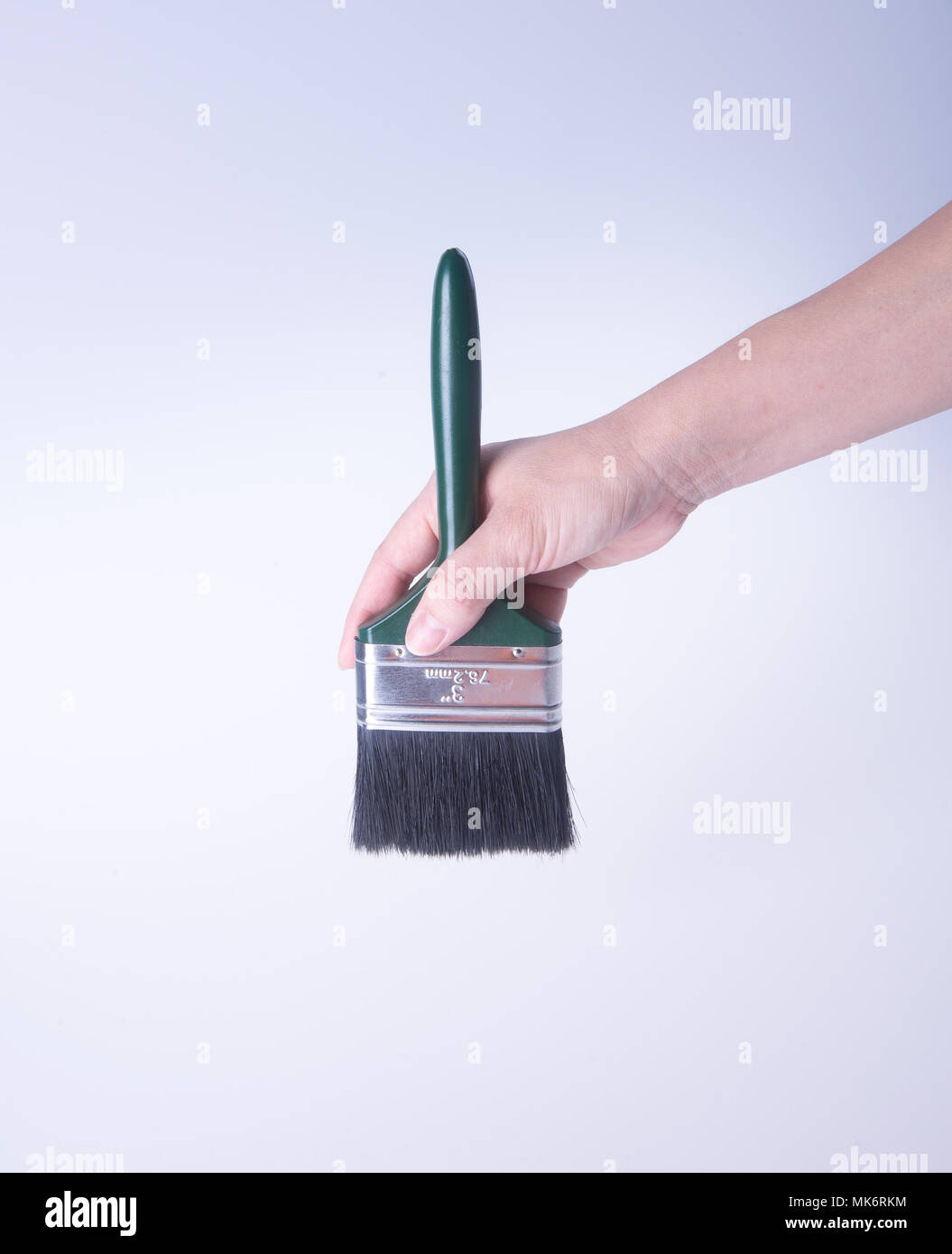 paint brush with hand. paint brush with hand on a background Stock ...