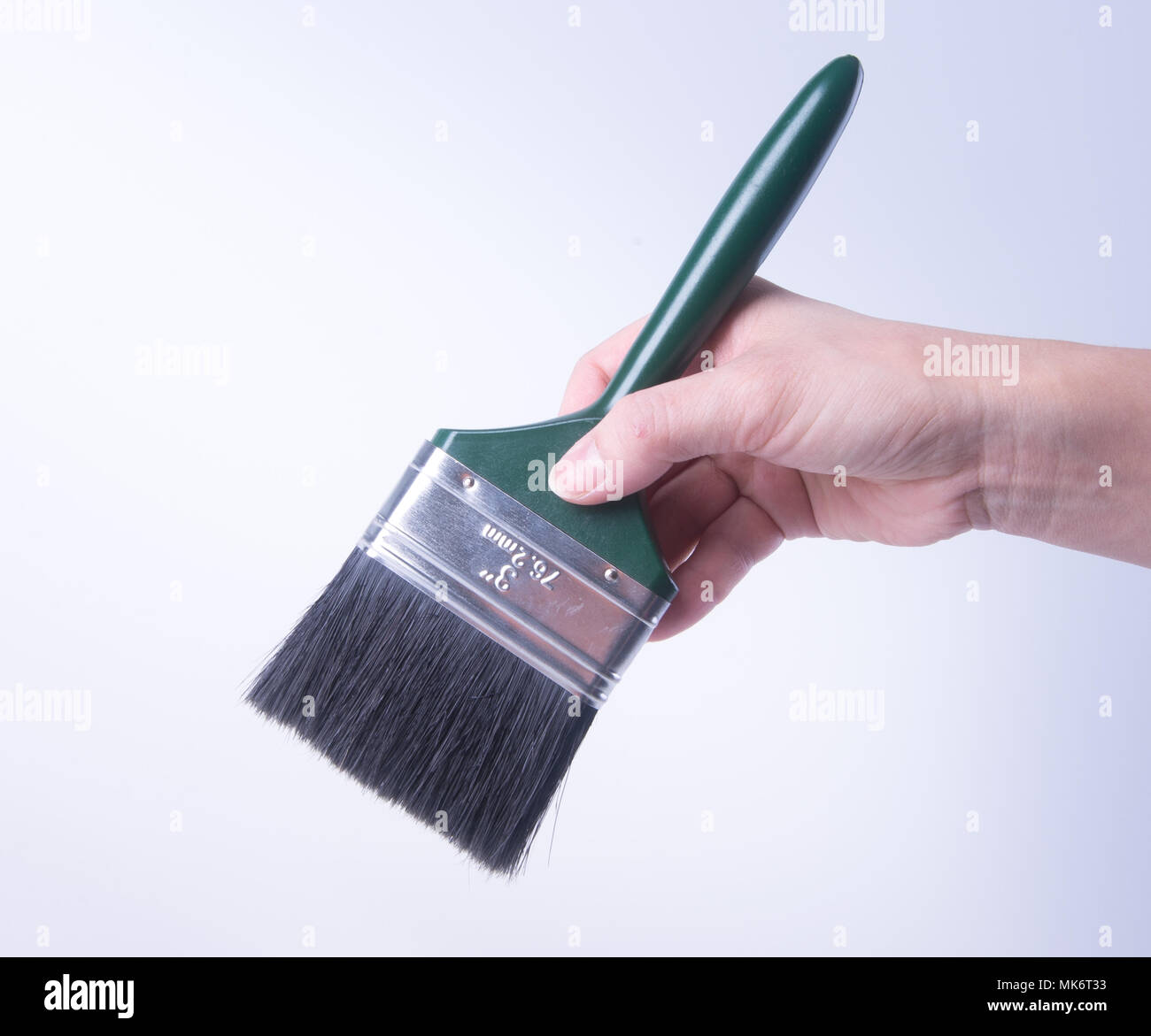 paint brush with hand. paint brush with hand on a background Stock ...