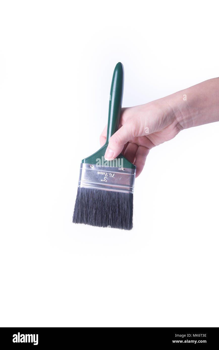 paint brush with hand. paint brush with hand on a background Stock ...